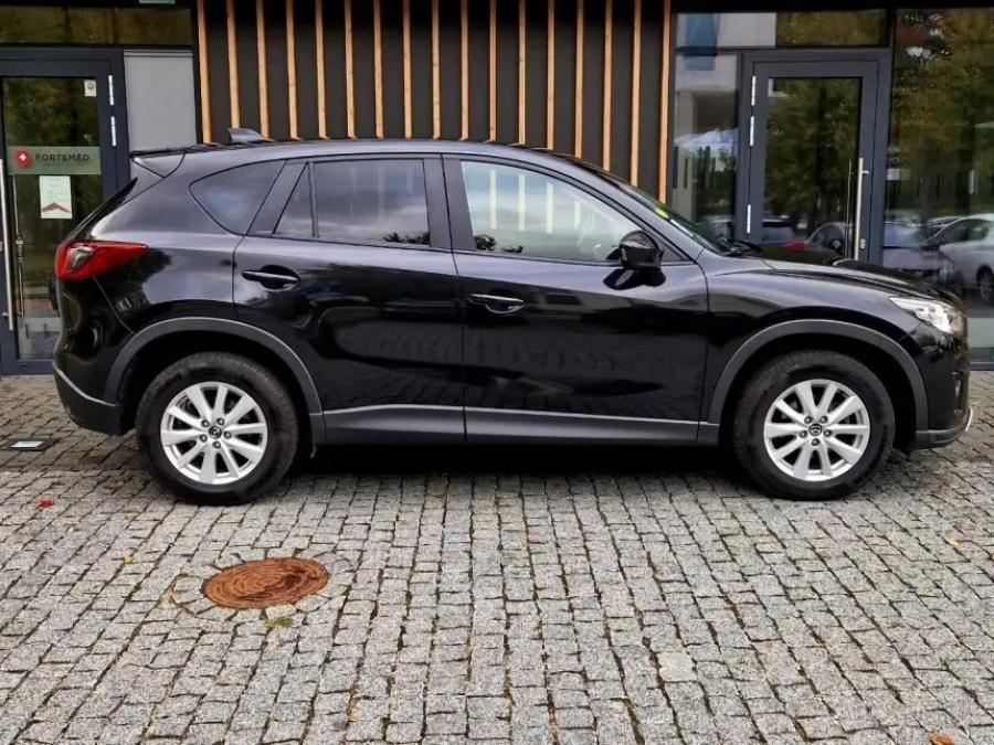 Black Mazda CX-5 2013 in Riga, with an engine capacity of 2.20 L and mileage of 187 thousand km for 11690 €, photo 5 on AUTOMOTO.COM.LV