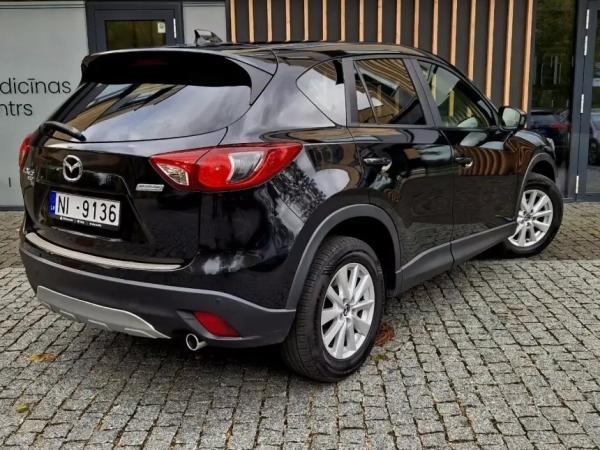 Melns Mazda CX-5 2013 Rīga, ar dzinēja tilpumu 2.20 L un nobraukumu 187 tūkst. km par 11690 €, foto 8 vietnē AUTOMOTO.COM.LV