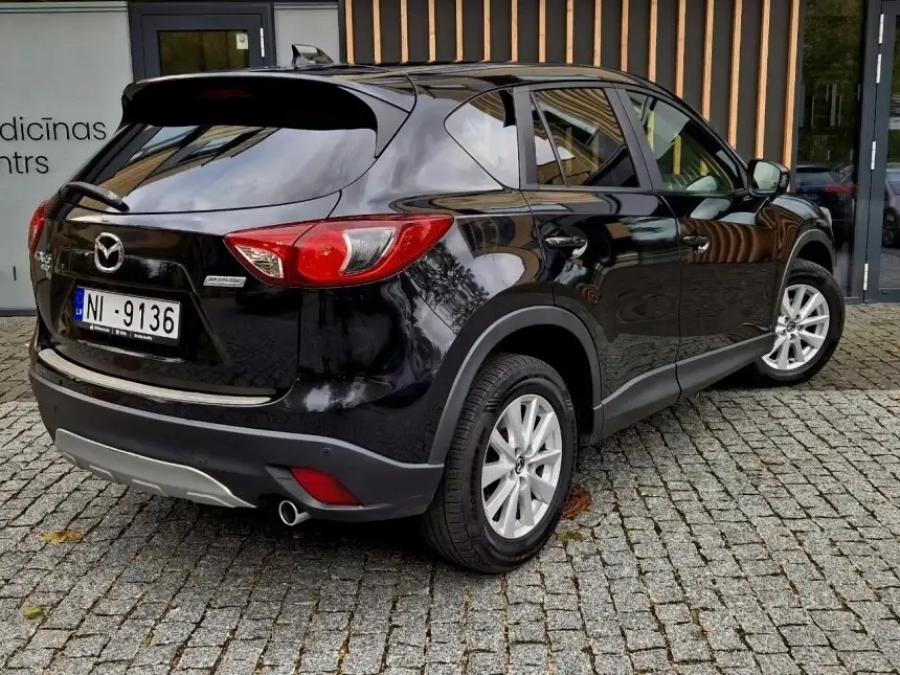 Black Mazda CX-5 2013 in Riga, with an engine capacity of 2.20 L and mileage of 187 thousand km for 11690 €, photo 9 on AUTOMOTO.COM.LV