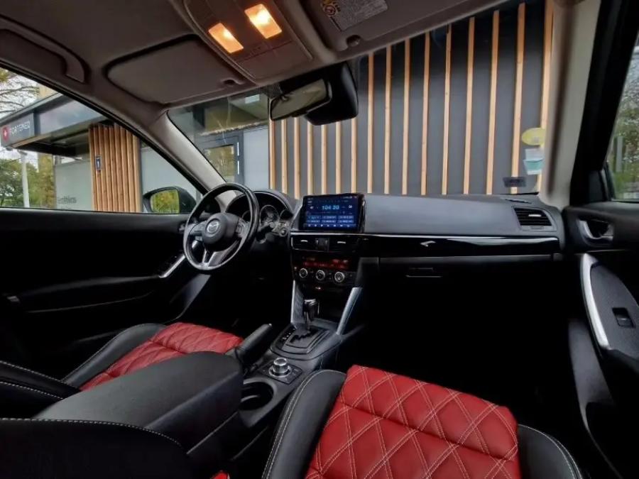 Black Mazda CX-5 2013 in Riga, with an engine capacity of 2.20 L and mileage of 187 thousand km for 11690 €, photo 14 on AUTOMOTO.COM.LV