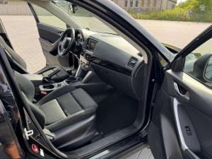 Melns Mazda CX-5 2013 Telšiai, ar dzinēja tilpumu 2.19 L un nobraukumu 239 tūkst. km par 6300 €, foto 25 vietnē AUTOMOTO.COM.LV