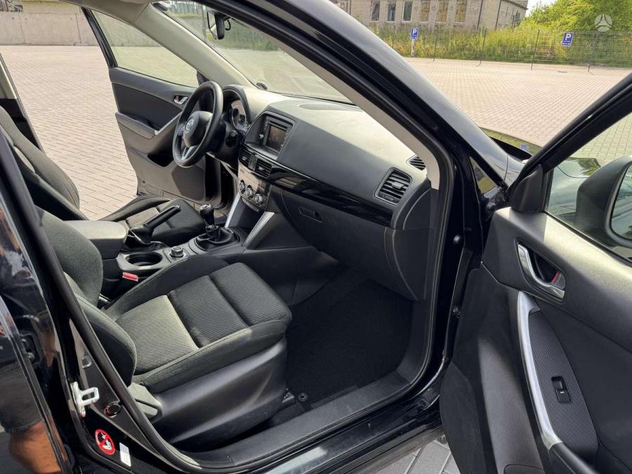 Melns Mazda CX-5 2013 Telšiai, ar dzinēja tilpumu 2.19 L un nobraukumu 239 tūkst. km par 6300 €, foto 25 vietnē AUTOMOTO.COM.LV
