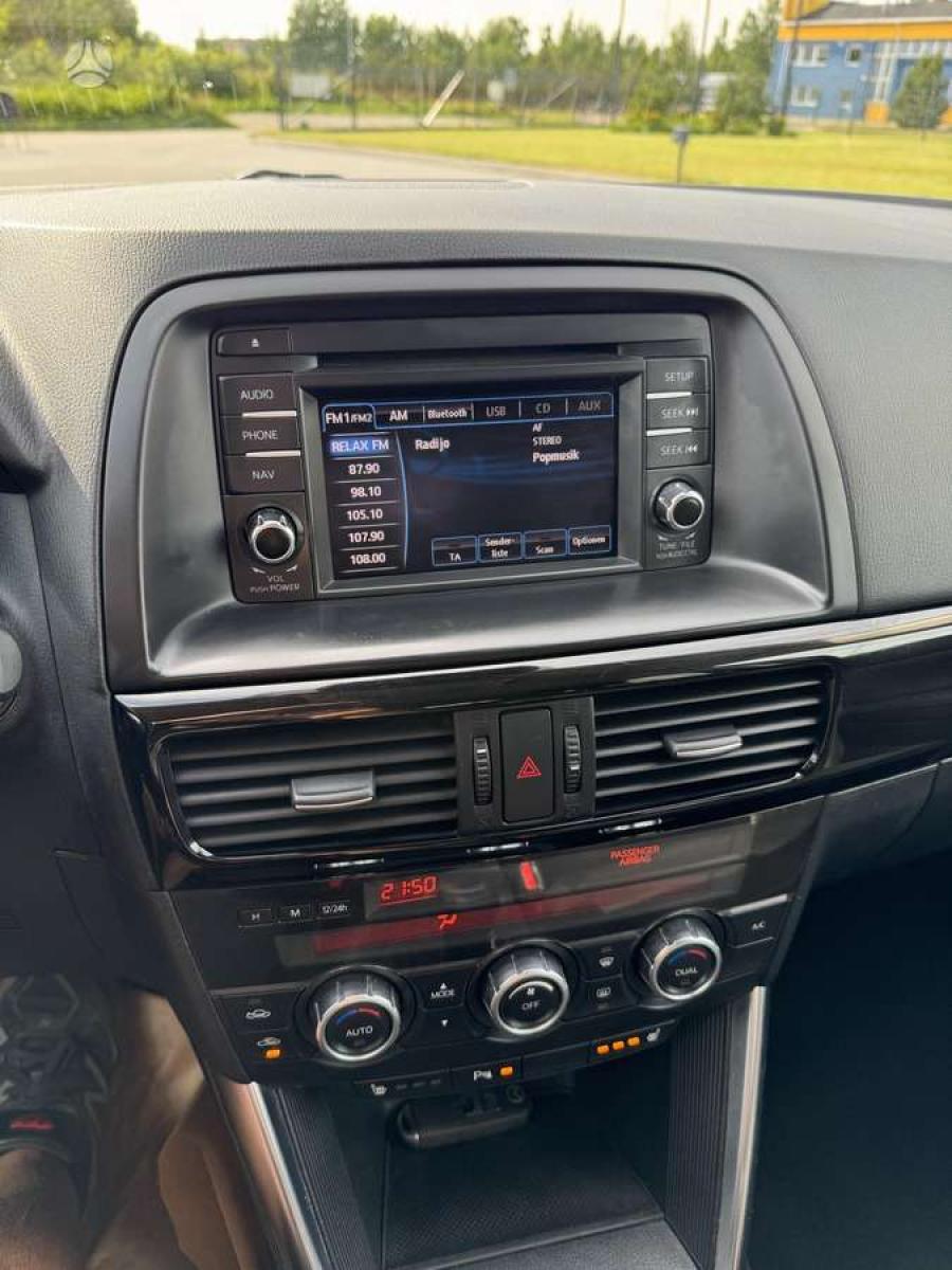Melns Mazda CX-5 2013 Telšiai, ar dzinēja tilpumu 2.19 L un nobraukumu 239 tūkst. km par 6300 €, foto 32 vietnē AUTOMOTO.COM.LV