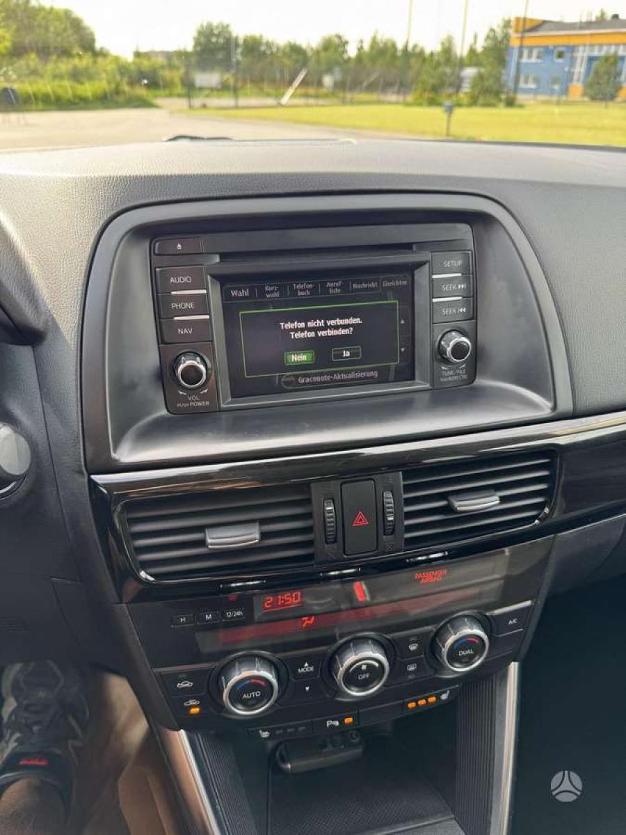 Melns Mazda CX-5 2013 Telšiai, ar dzinēja tilpumu 2.19 L un nobraukumu 239 tūkst. km par 6300 €, foto 34 vietnē AUTOMOTO.COM.LV