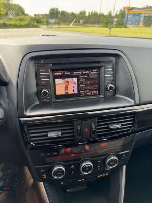 Melns Mazda CX-5 2013 Telšiai, ar dzinēja tilpumu 2.19 L un nobraukumu 239 tūkst. km par 6300 €, foto 35 vietnē AUTOMOTO.COM.LV