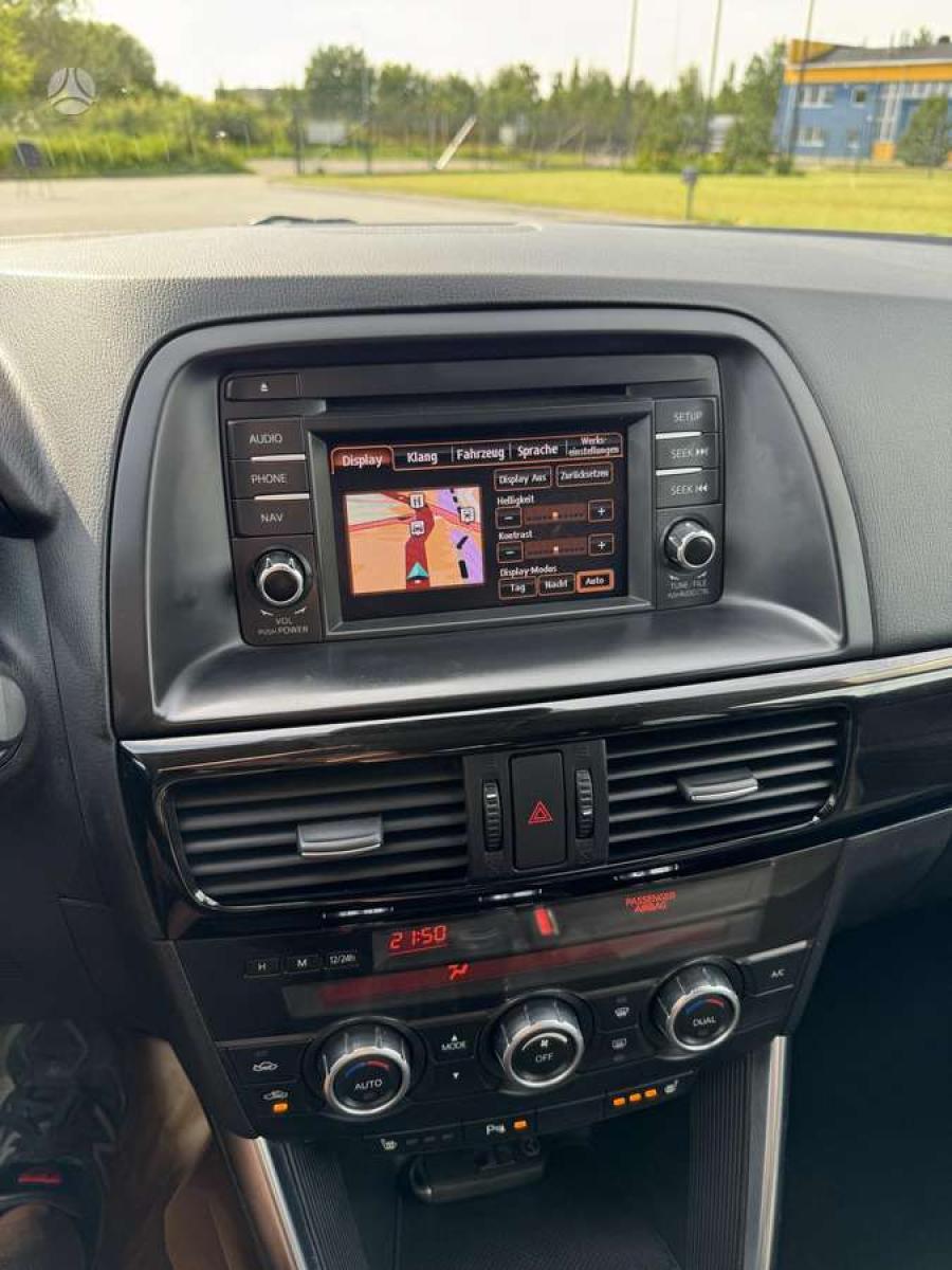 Melns Mazda CX-5 2013 Telšiai, ar dzinēja tilpumu 2.19 L un nobraukumu 239 tūkst. km par 6300 €, foto 35 vietnē AUTOMOTO.COM.LV