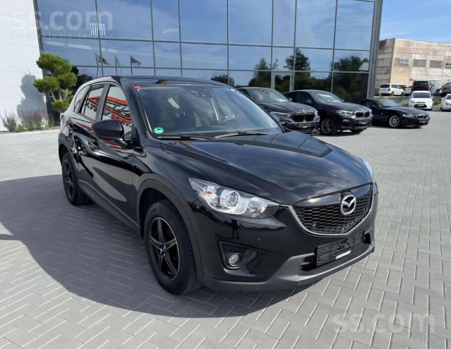 Melns Mazda CX-5 2013 Telšiai, ar dzinēja tilpumu 2.20 L un nobraukumu 239 tūkst. km par 6290 €, foto 1 vietnē AUTOMOTO.COM.LV