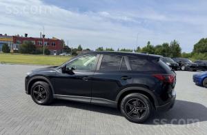 Melns Mazda CX-5 2013 Telšiai, ar dzinēja tilpumu 2.20 L un nobraukumu 239 tūkst. km par 6290 €, foto 8 vietnē AUTOMOTO.COM.LV