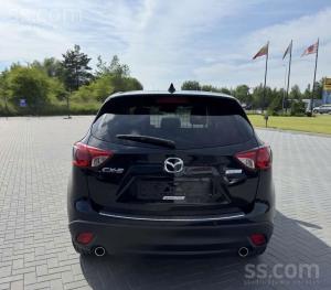 Melns Mazda CX-5 2013 Telšiai, ar dzinēja tilpumu 2.20 L un nobraukumu 239 tūkst. km par 6290 €, foto 9 vietnē AUTOMOTO.COM.LV