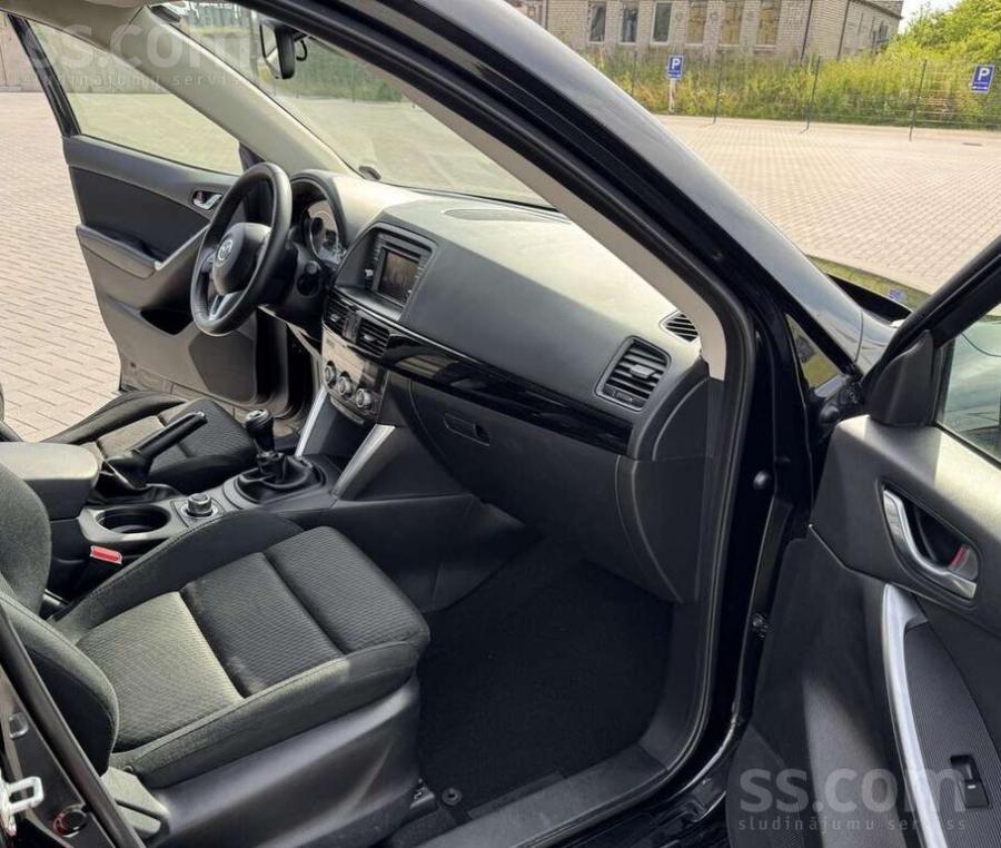Melns Mazda CX-5 2013 Telšiai, ar dzinēja tilpumu 2.20 L un nobraukumu 239 tūkst. km par 6290 €, foto 12 vietnē AUTOMOTO.COM.LV