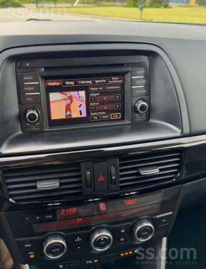 Melns Mazda CX-5 2013 Telšiai, ar dzinēja tilpumu 2.20 L un nobraukumu 239 tūkst. km par 6290 €, foto 20 vietnē AUTOMOTO.COM.LV