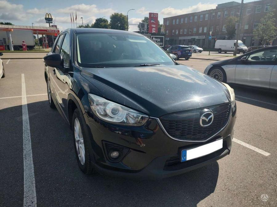 Black Mazda CX-5 2013 in Kaunas, with an engine capacity of 2.19 L and mileage of 281 thousand km for 4490 €, photo 6 on AUTOMOTO.COM.LV