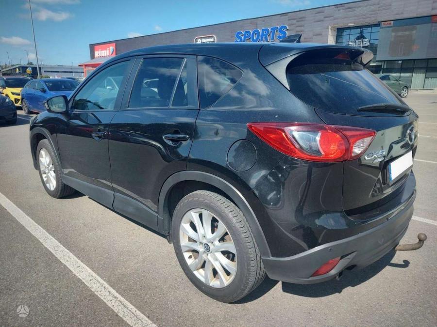 Black Mazda CX-5 2013 in Kaunas, with an engine capacity of 2.19 L and mileage of 281 thousand km for 4490 €, photo 8 on AUTOMOTO.COM.LV