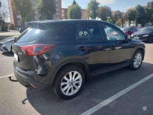 Black Mazda CX-5 2013 in Kaunas, with an engine capacity of 2.19 L and mileage of 281 thousand km for 4490 €, photo 11 on AUTOMOTO.COM.LV