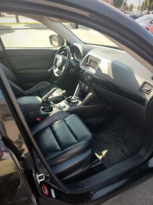 Black Mazda CX-5 2013 in Kaunas, with an engine capacity of 2.19 L and mileage of 281 thousand km for 4490 €, photo 15 on AUTOMOTO.COM.LV