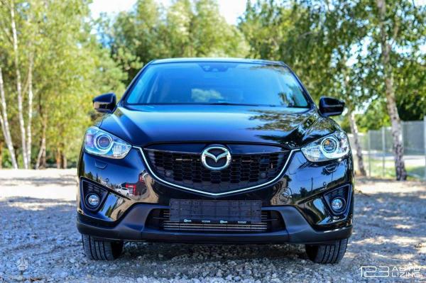 Black Mazda CX-5 2013 in Kretinga, with an engine capacity of 2.20 L and mileage of 193 thousand km for 7650 €, photo 3 on AUTOMOTO.COM.LV