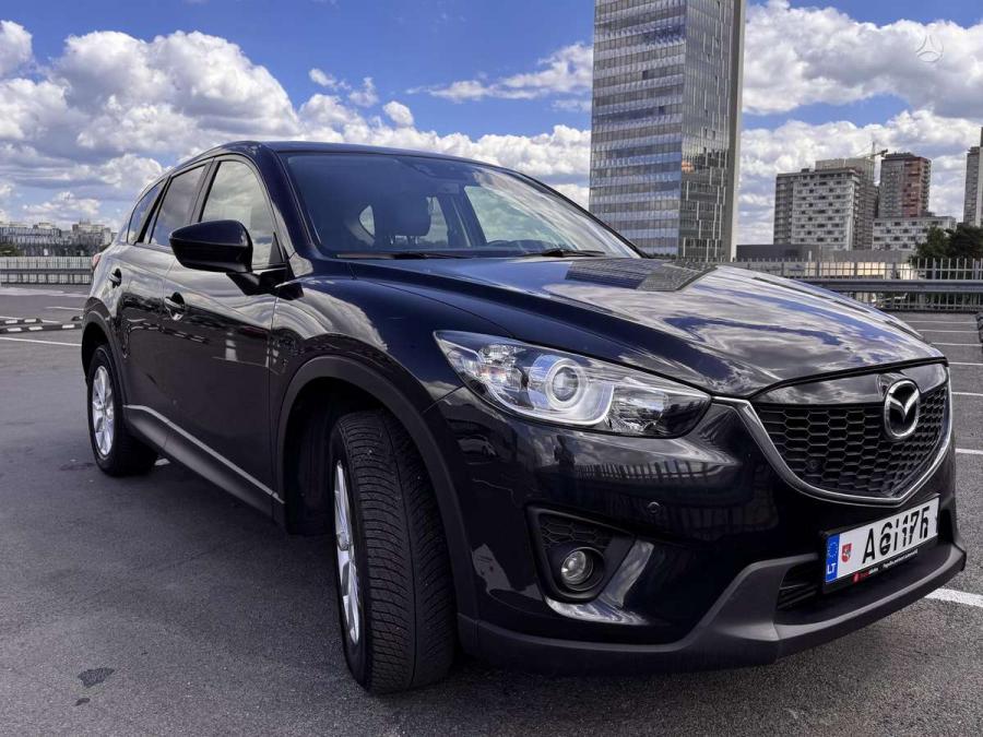 Black Mazda CX-5 2013 in Vilnius, with an engine capacity of 2.19 L and mileage of 238 thousand km for 4000 €, photo 3 on AUTOMOTO.COM.LV