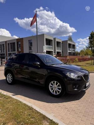 Black Mazda CX-5 2013 in Vilnius, with an engine capacity of 2.19 L and mileage of 238 thousand km for 4000 €, photo 4 on AUTOMOTO.COM.LV