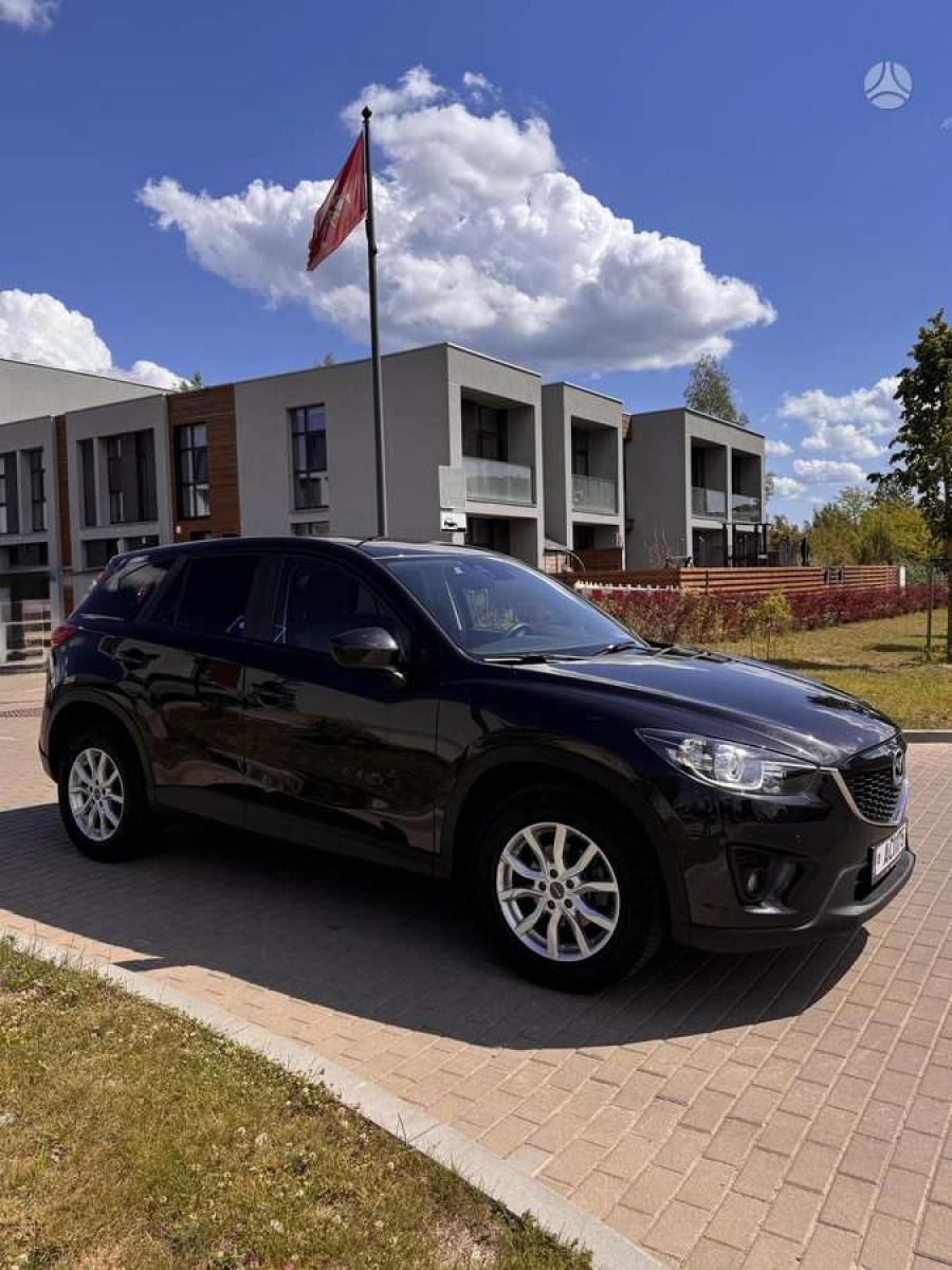 Black Mazda CX-5 2013 in Vilnius, with an engine capacity of 2.19 L and mileage of 238 thousand km for 4000 €, photo 4 on AUTOMOTO.COM.LV