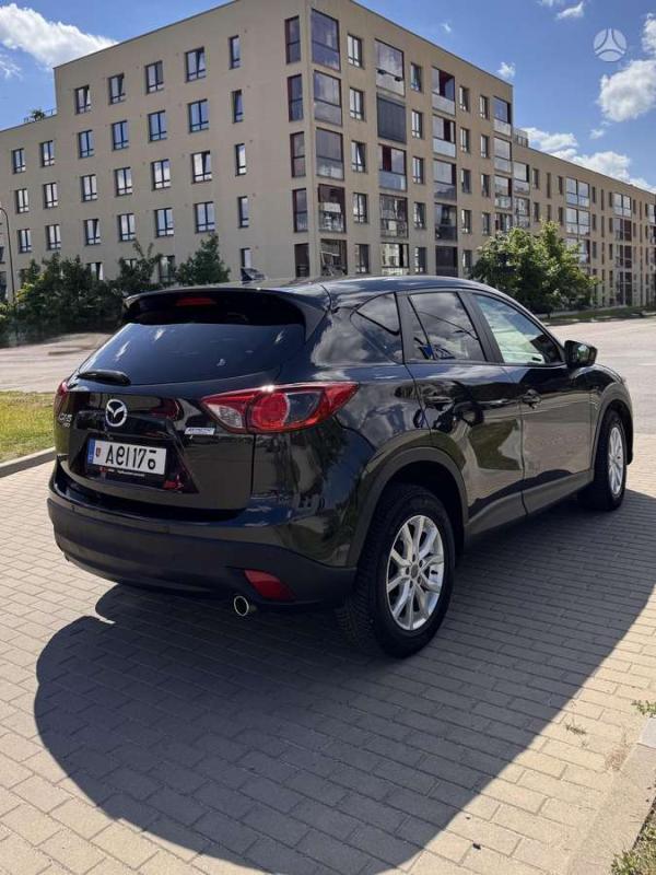 Melns Mazda CX-5 2013 Viļņa, ar dzinēja tilpumu 2.19 L un nobraukumu 238 tūkst. km par 4000 €, foto 5 vietnē AUTOMOTO.COM.LV