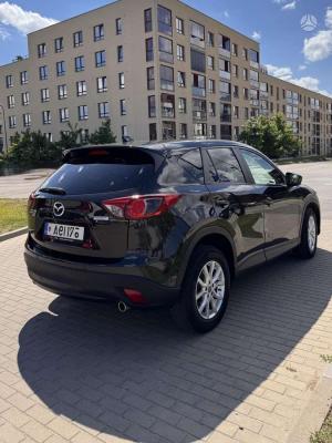 Black Mazda CX-5 2013 in Vilnius, with an engine capacity of 2.19 L and mileage of 238 thousand km for 4000 €, photo 6 on AUTOMOTO.COM.LV
