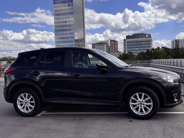 Melns Mazda CX-5 2013 Viļņa, ar dzinēja tilpumu 2.19 L un nobraukumu 238 tūkst. km par 4000 €, foto 8 vietnē AUTOMOTO.COM.LV