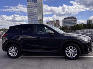 Black Mazda CX-5 2013 in Vilnius, with an engine capacity of 2.19 L and mileage of 238 thousand km for 4000 €, photo 9 on AUTOMOTO.COM.LV