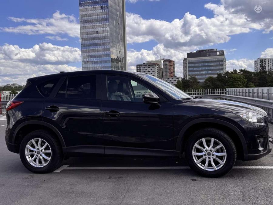 Black Mazda CX-5 2013 in Vilnius, with an engine capacity of 2.19 L and mileage of 238 thousand km for 4000 €, photo 9 on AUTOMOTO.COM.LV