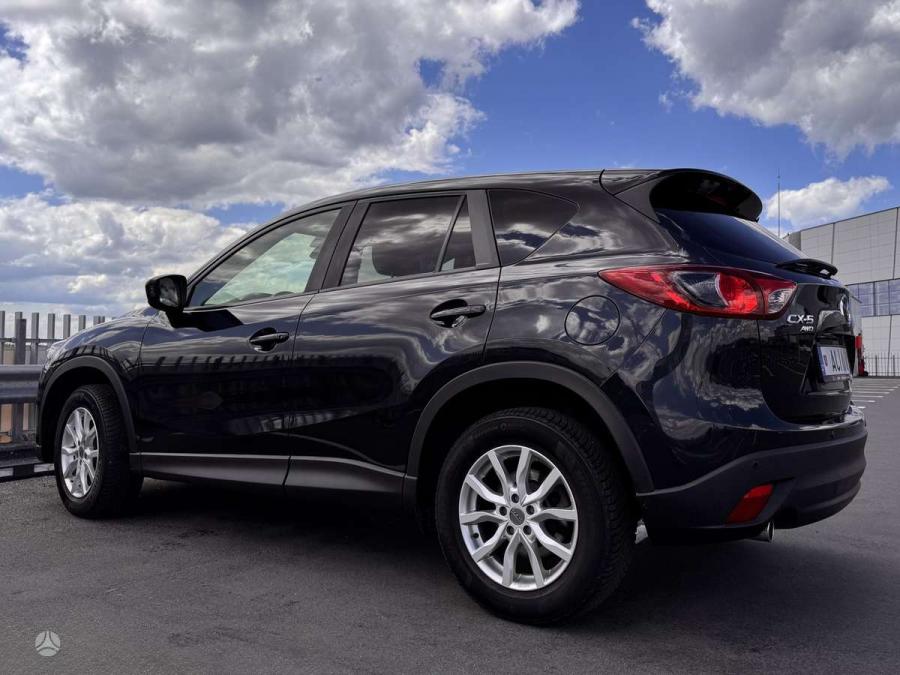 Black Mazda CX-5 2013 in Vilnius, with an engine capacity of 2.19 L and mileage of 238 thousand km for 4000 €, photo 10 on AUTOMOTO.COM.LV