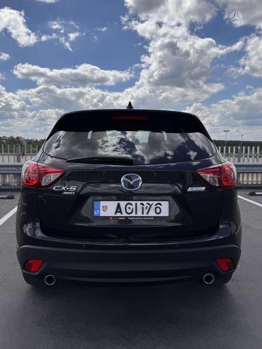 Black Mazda CX-5 2013 in Vilnius, with an engine capacity of 2.19 L and mileage of 238 thousand km for 4000 €, photo 11 on AUTOMOTO.COM.LV