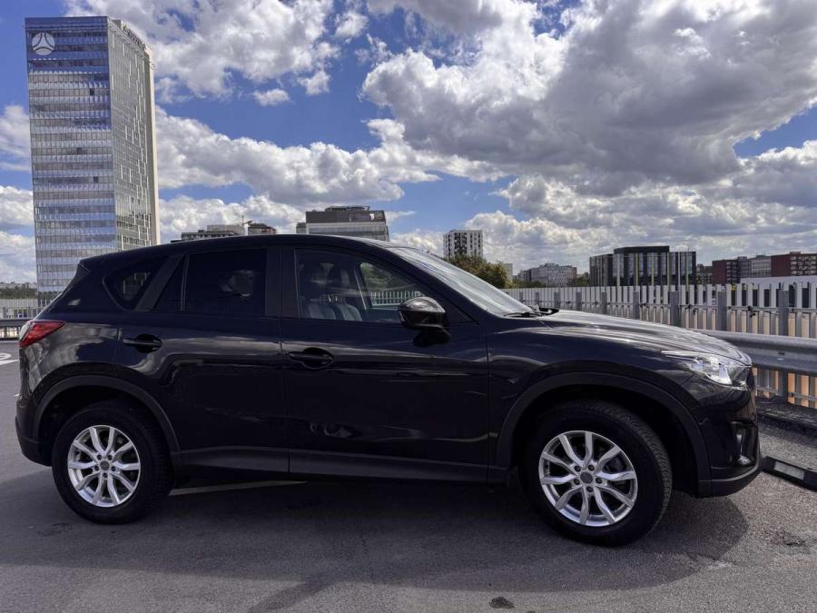 Black Mazda CX-5 2013 in Vilnius, with an engine capacity of 2.19 L and mileage of 238 thousand km for 4000 €, photo 12 on AUTOMOTO.COM.LV