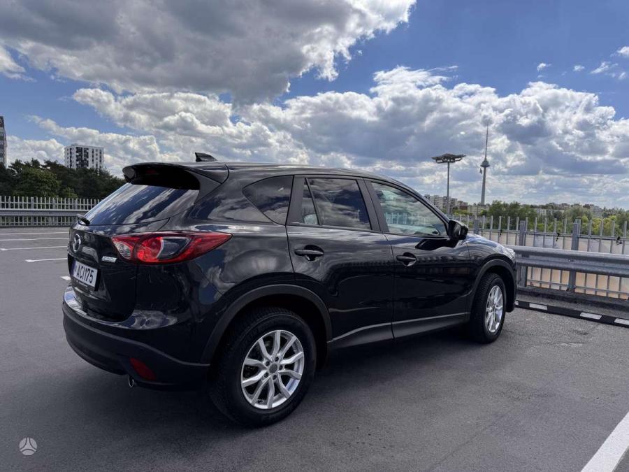Black Mazda CX-5 2013 in Vilnius, with an engine capacity of 2.19 L and mileage of 238 thousand km for 4000 €, photo 13 on AUTOMOTO.COM.LV