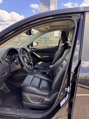 Black Mazda CX-5 2013 in Vilnius, with an engine capacity of 2.19 L and mileage of 238 thousand km for 4000 €, photo 14 on AUTOMOTO.COM.LV