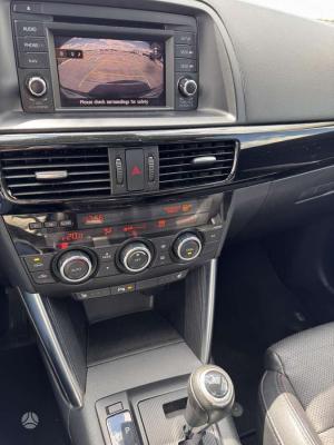 Black Mazda CX-5 2013 in Vilnius, with an engine capacity of 2.19 L and mileage of 238 thousand km for 4000 €, photo 15 on AUTOMOTO.COM.LV