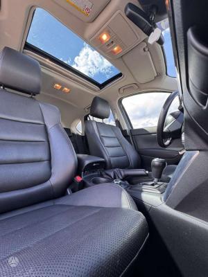 Black Mazda CX-5 2013 in Vilnius, with an engine capacity of 2.19 L and mileage of 238 thousand km for 4000 €, photo 16 on AUTOMOTO.COM.LV
