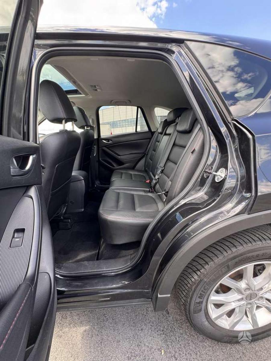 Black Mazda CX-5 2013 in Vilnius, with an engine capacity of 2.19 L and mileage of 238 thousand km for 4000 €, photo 18 on AUTOMOTO.COM.LV