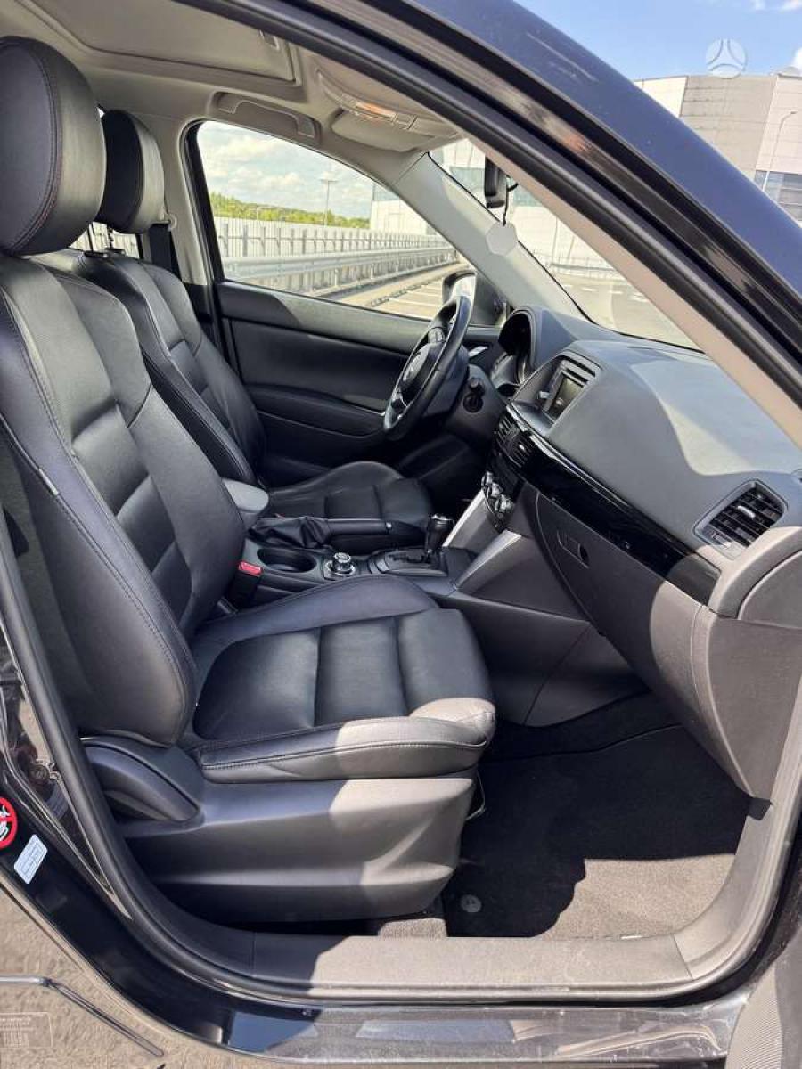 Black Mazda CX-5 2013 in Vilnius, with an engine capacity of 2.19 L and mileage of 238 thousand km for 4000 €, photo 19 on AUTOMOTO.COM.LV