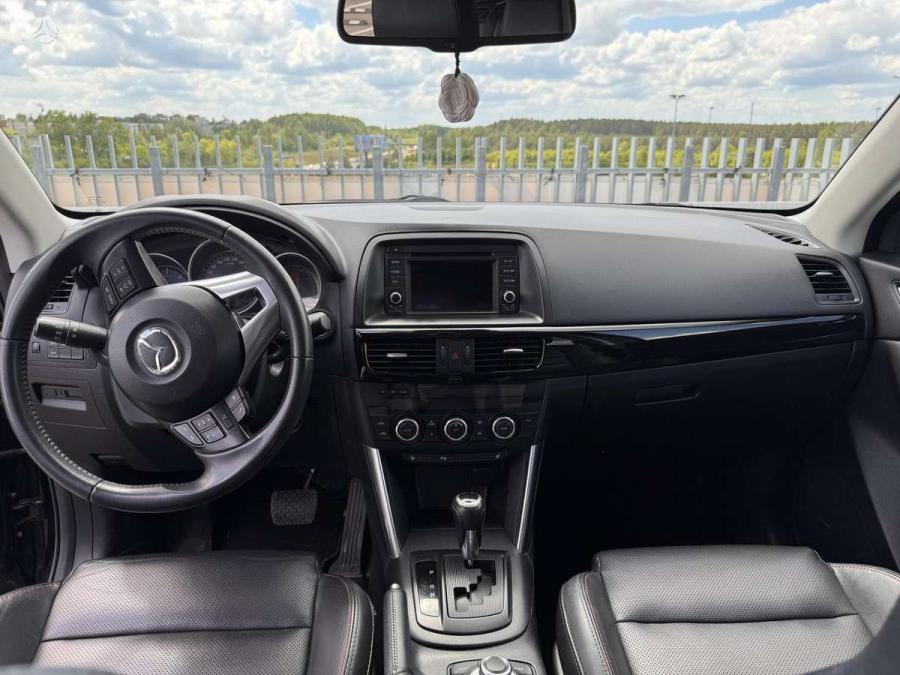Black Mazda CX-5 2013 in Vilnius, with an engine capacity of 2.19 L and mileage of 238 thousand km for 4000 €, photo 20 on AUTOMOTO.COM.LV
