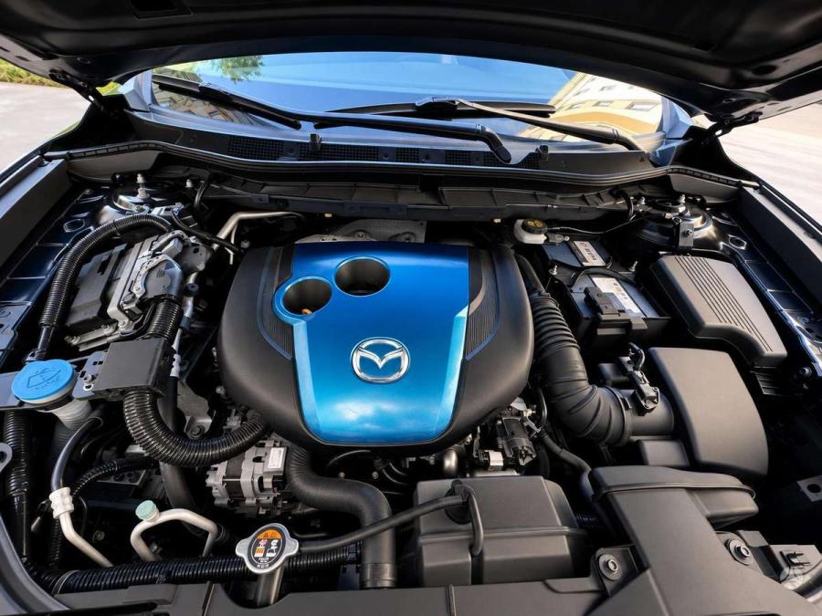 Black Mazda CX-5 2013 in Vilnius, with an engine capacity of 2.19 L and mileage of 238 thousand km for 4000 €, photo 23 on AUTOMOTO.COM.LV