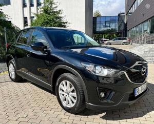 Melns Mazda CX-5 2013 Kauņa, ar dzinēja tilpumu 2.20 L un nobraukumu 214 tūkst. km par 5700 €, foto  vietnē AUTOMOTO.COM.LV
