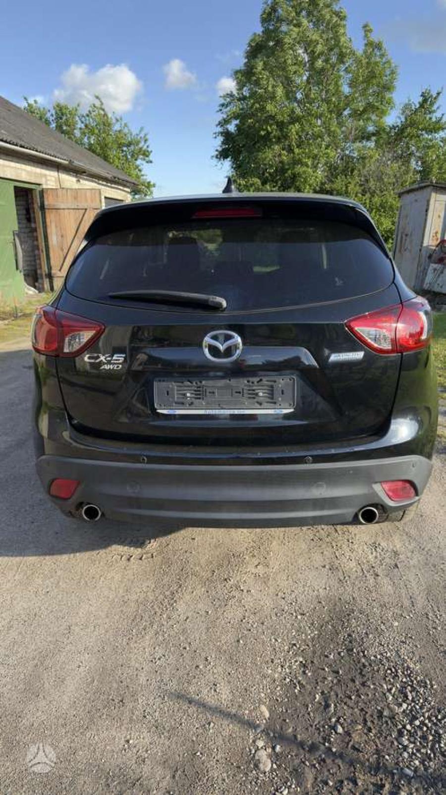 Black Mazda CX-5 2013 in Sakiai, with an engine capacity of 2.19 L and mileage of 105 thousand km for 5400 €, photo 18 on AUTOMOTO.COM.LV