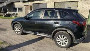 Black Mazda CX-5 2013 in Sakiai, with an engine capacity of 2.19 L and mileage of 105 thousand km for 5400 €, photo 4 on AUTOMOTO.COM.LV