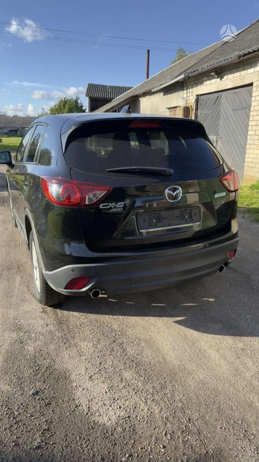 Black Mazda CX-5 2013 in Sakiai, with an engine capacity of 2.19 L and mileage of 105 thousand km for 5400 €, photo 5 on AUTOMOTO.COM.LV