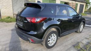 Black Mazda CX-5 2013 in Sakiai, with an engine capacity of 2.19 L and mileage of 105 thousand km for 5400 €, photo 6 on AUTOMOTO.COM.LV