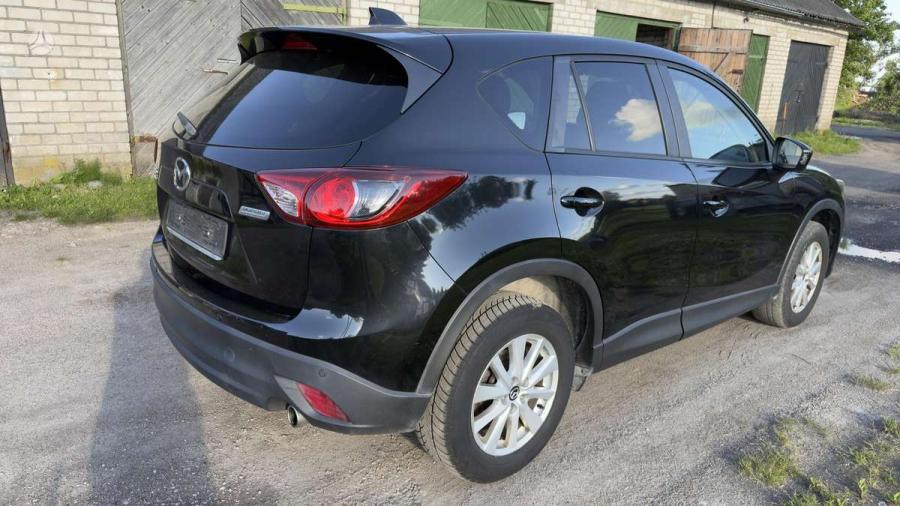 Black Mazda CX-5 2013 in Sakiai, with an engine capacity of 2.19 L and mileage of 105 thousand km for 5400 €, photo 6 on AUTOMOTO.COM.LV