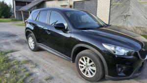 Black Mazda CX-5 2013 in Sakiai, with an engine capacity of 2.19 L and mileage of 105 thousand km for 5400 €, photo 7 on AUTOMOTO.COM.LV