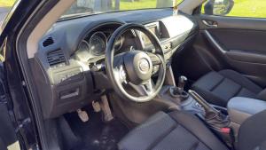 Black Mazda CX-5 2013 in Sakiai, with an engine capacity of 2.19 L and mileage of 105 thousand km for 5400 €, photo 8 on AUTOMOTO.COM.LV