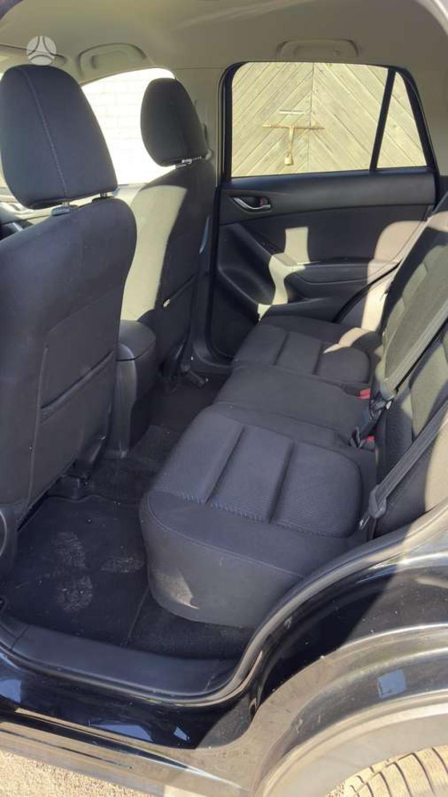 Black Mazda CX-5 2013 in Sakiai, with an engine capacity of 2.19 L and mileage of 105 thousand km for 5400 €, photo 11 on AUTOMOTO.COM.LV
