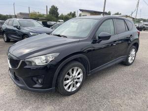 Black Mazda CX-5 2013 in Panevezys, with an engine capacity of 2.19 L and mileage of 207 thousand km for 5750 €, photo  on AUTOMOTO.COM.LV
