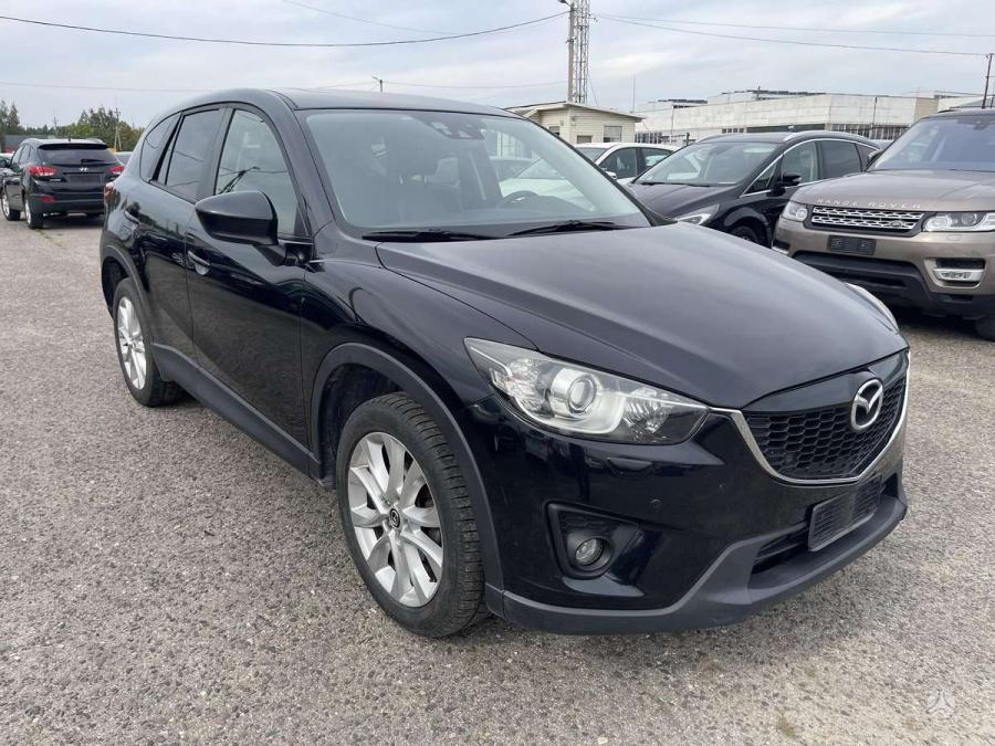 Black Mazda CX-5 2013 in Panevezys, with an engine capacity of 2.19 L and mileage of 207 thousand km for 5750 €, photo 4 on AUTOMOTO.COM.LV